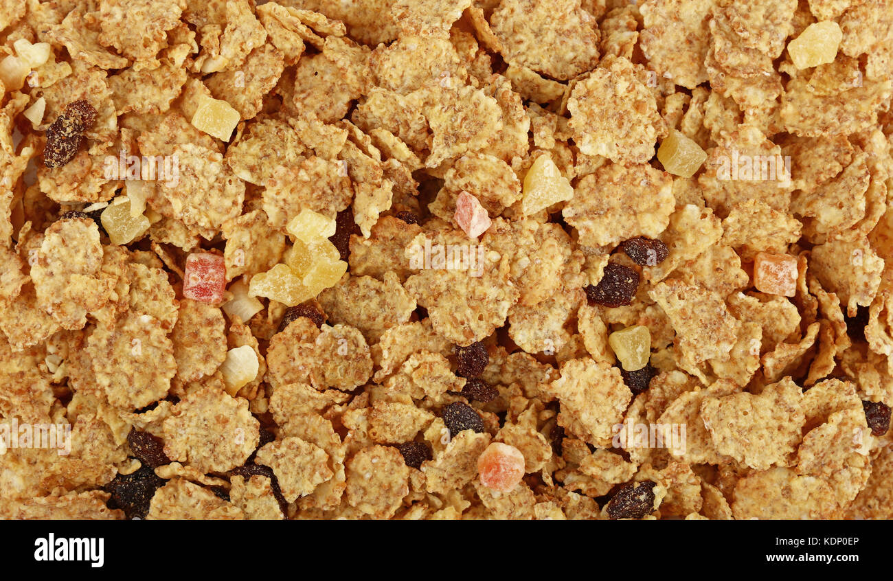 Breakfast granola muesli with dried fruits close up pattern background ...