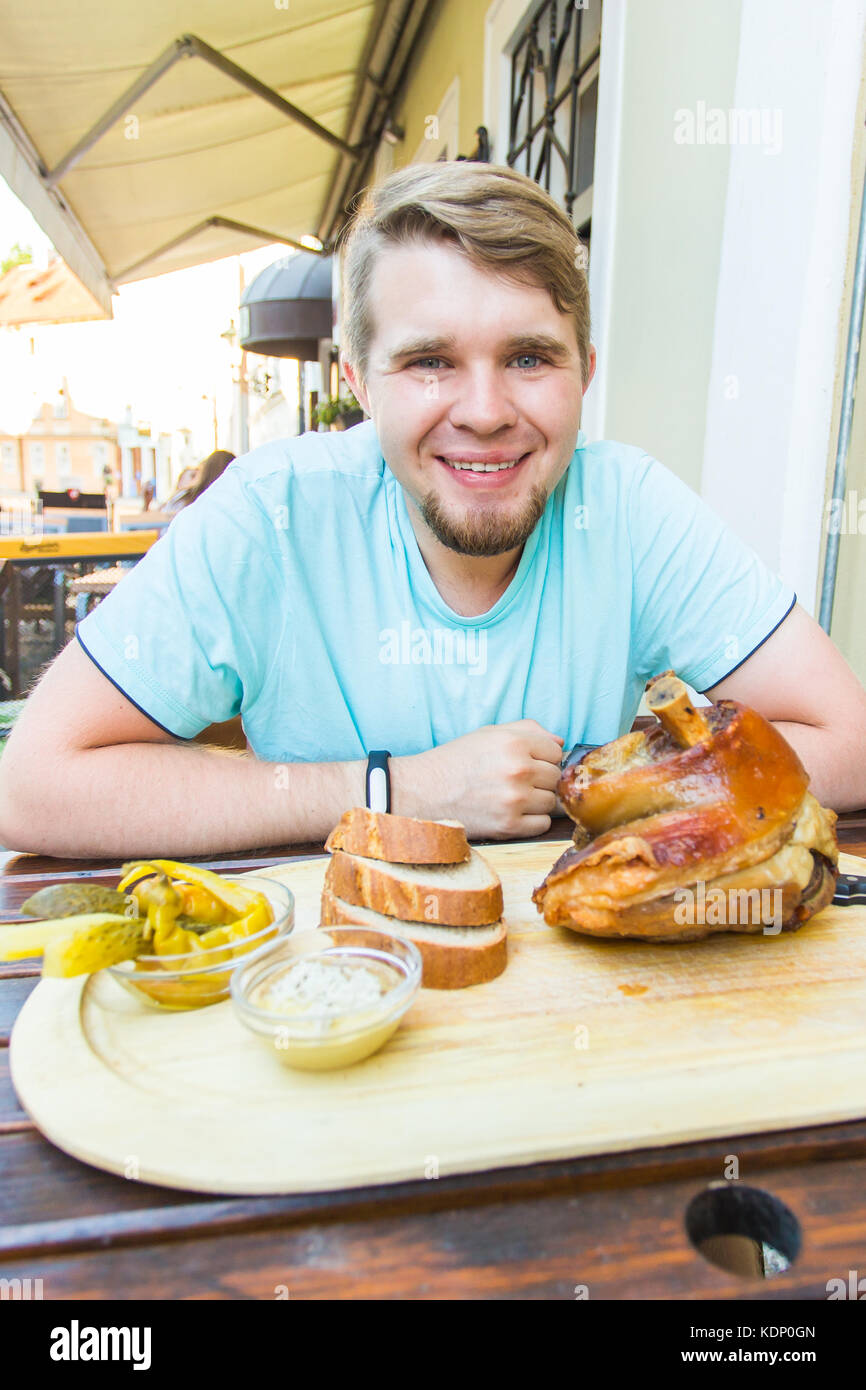 Man eating pork ribs hi-res stock photography and images - Alamy