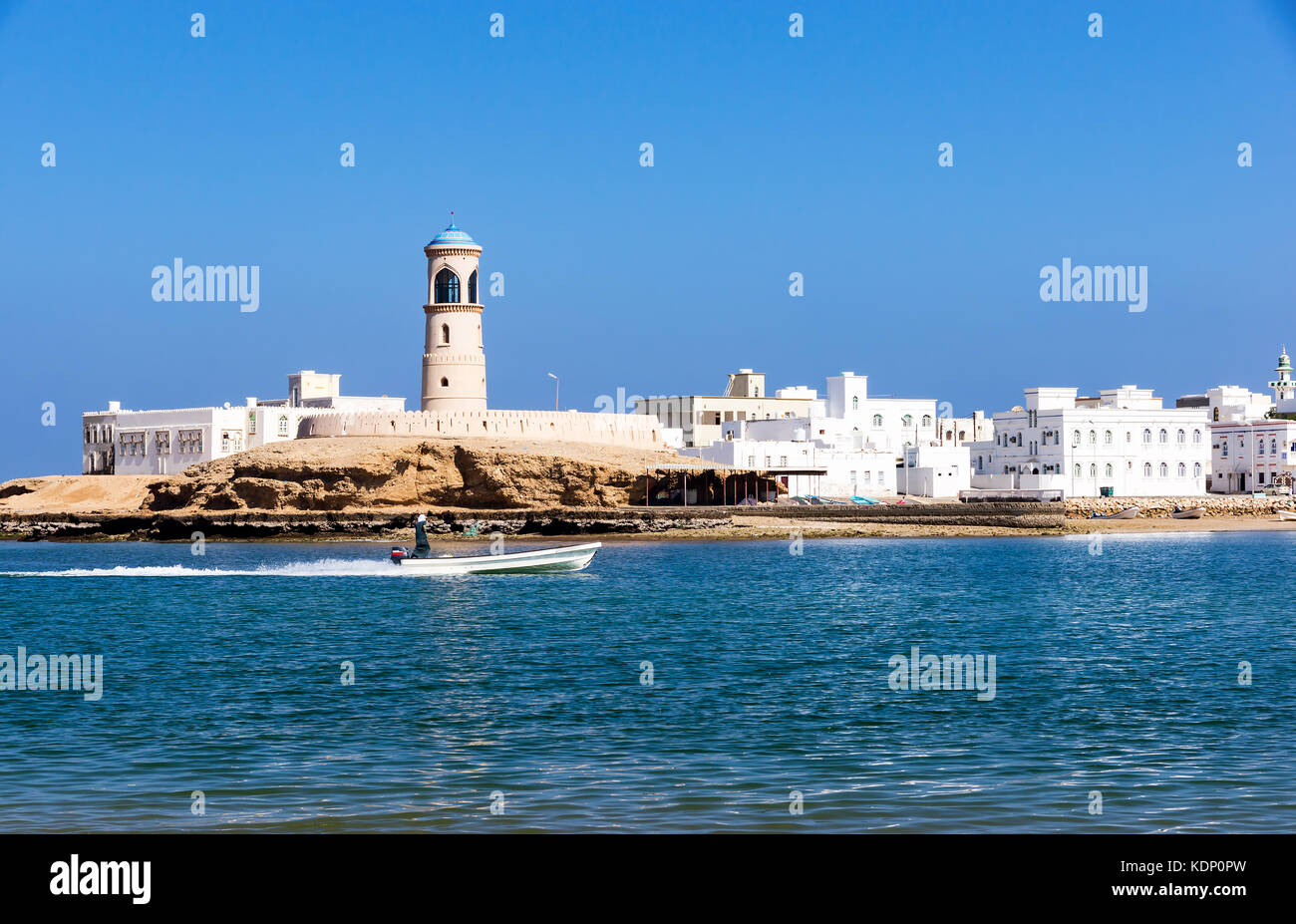 Sur Lighthouse with fisherman boat - Sur, Oman Stock Photo - Alamy