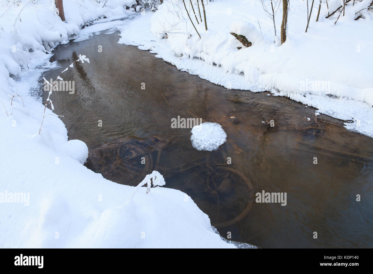 Abandoned bicycle in small stream Stock Photo - Alamy