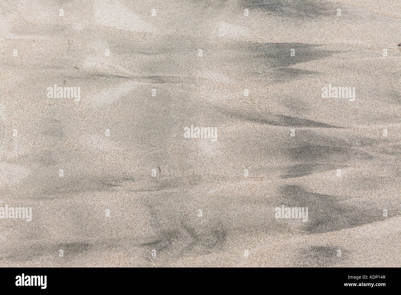 Wet sand patterns Stock Photo - Alamy