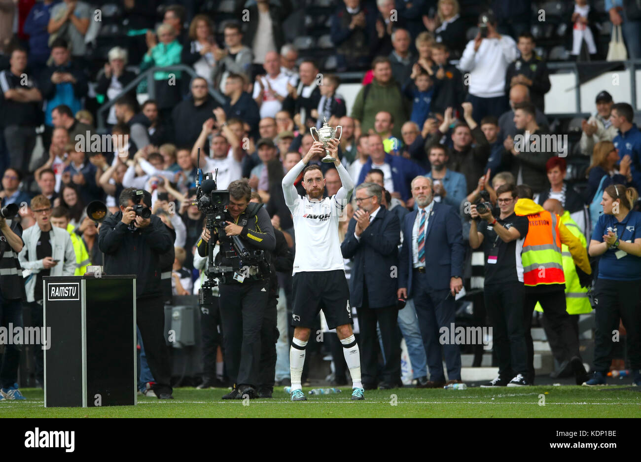 Derby County's Richard Keogh celebrates with the Brian Clough Cup ...