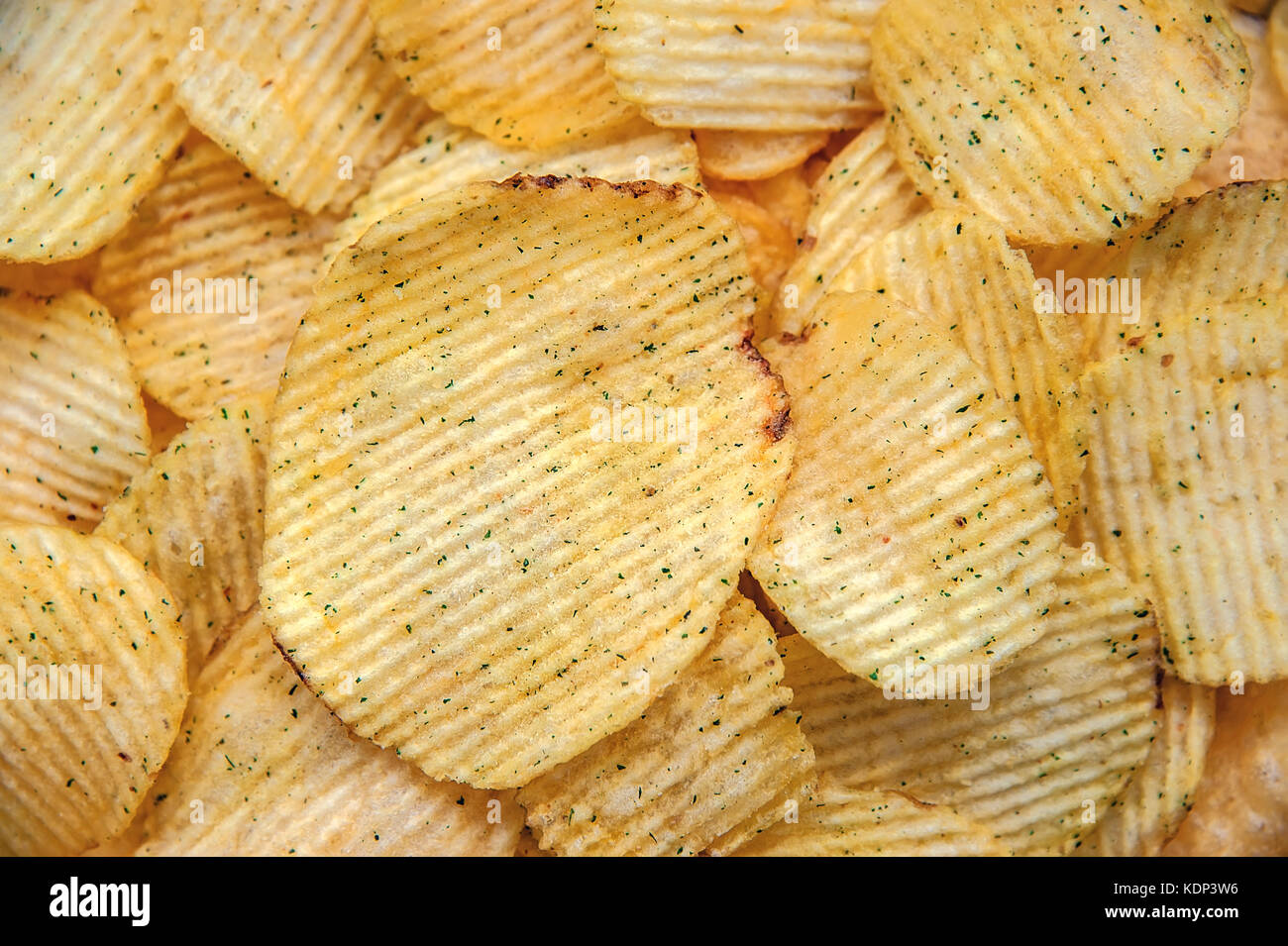 Beautiful Golden chips. Food background. A horizontal frame Stock Photo ...