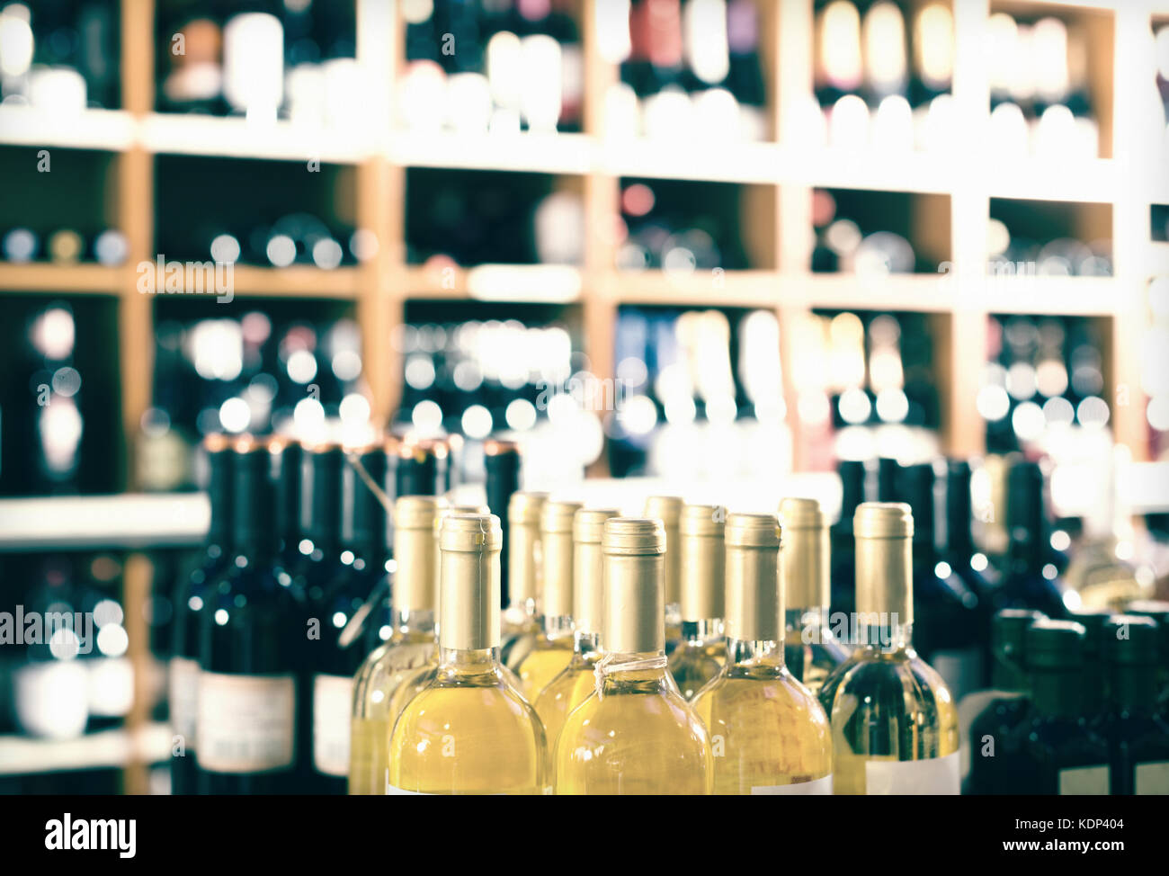 View on wine shop shelves with wide assortment of wine bottles Stock ...