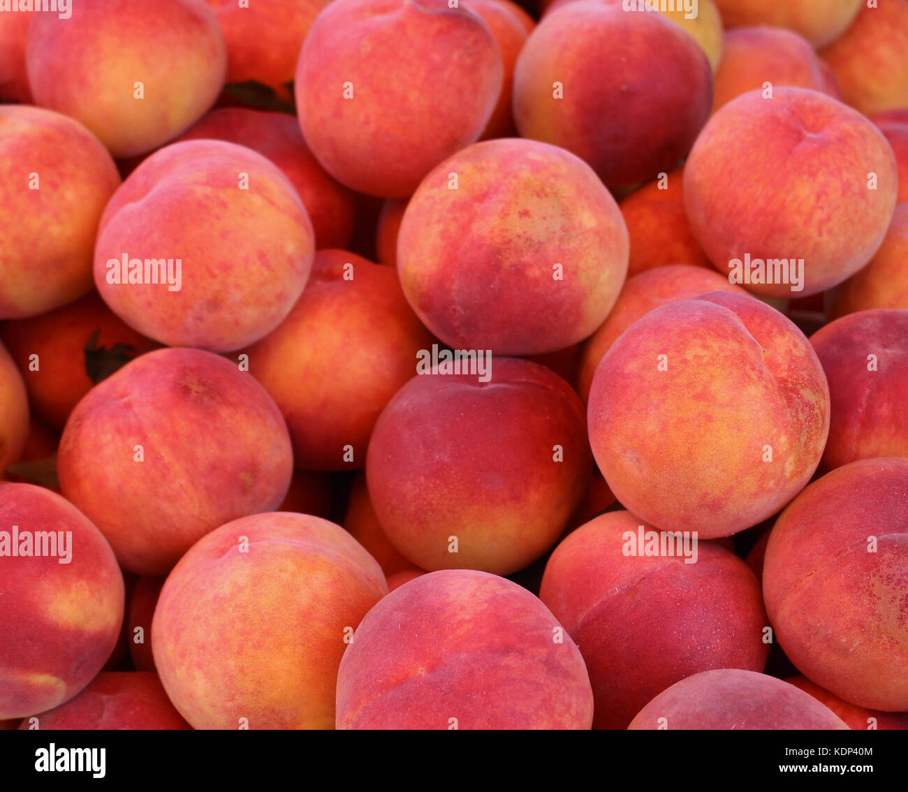 Big pile of fresh organic ripe peaches Stock Photo - Alamy