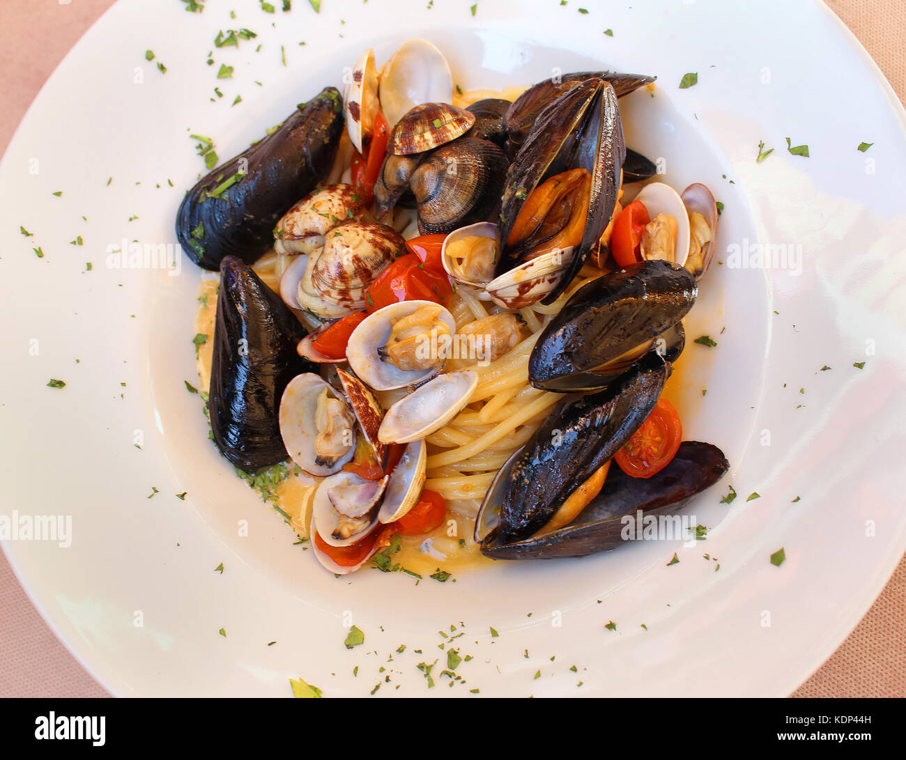 Fresh seafood pasta with shellfish and tomato sauce Stock Photo - Alamy