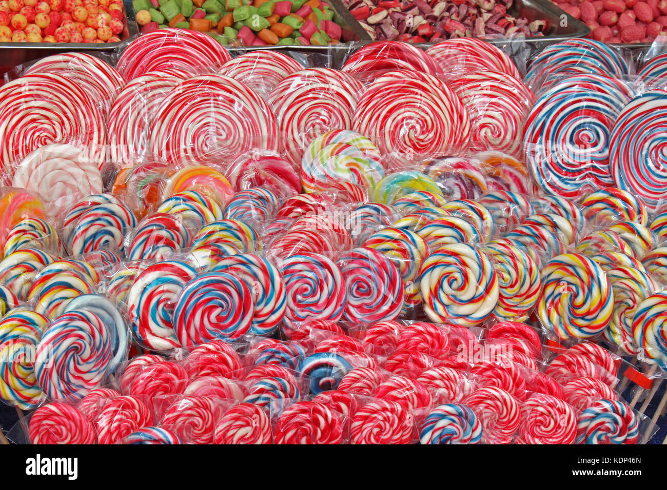 Bunch of sweet colorful candy wrapped in cellophane Stock Photo - Alamy