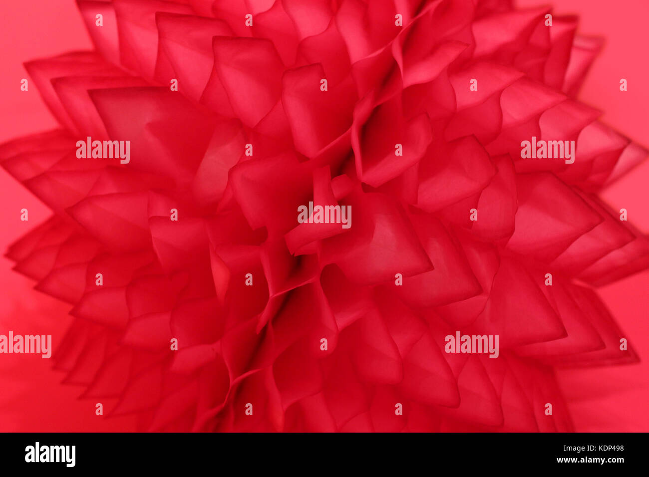 Closeup of bright pink ornamental paper flower Stock Photo - Alamy