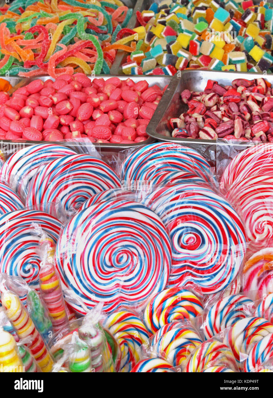 Colorful sweet foods sold on local fair stand Stock Photo - Alamy