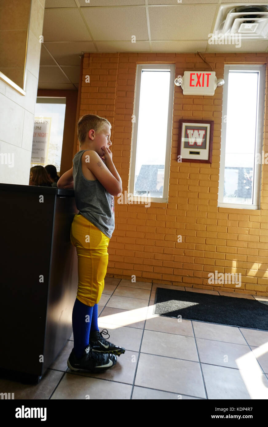 Young boy showing anxiety Stock Photo - Alamy