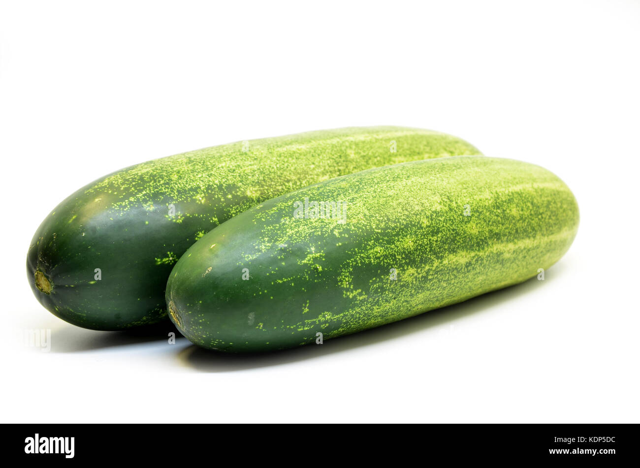 Fresh green cucumber isolated on white background Stock Photo - Alamy