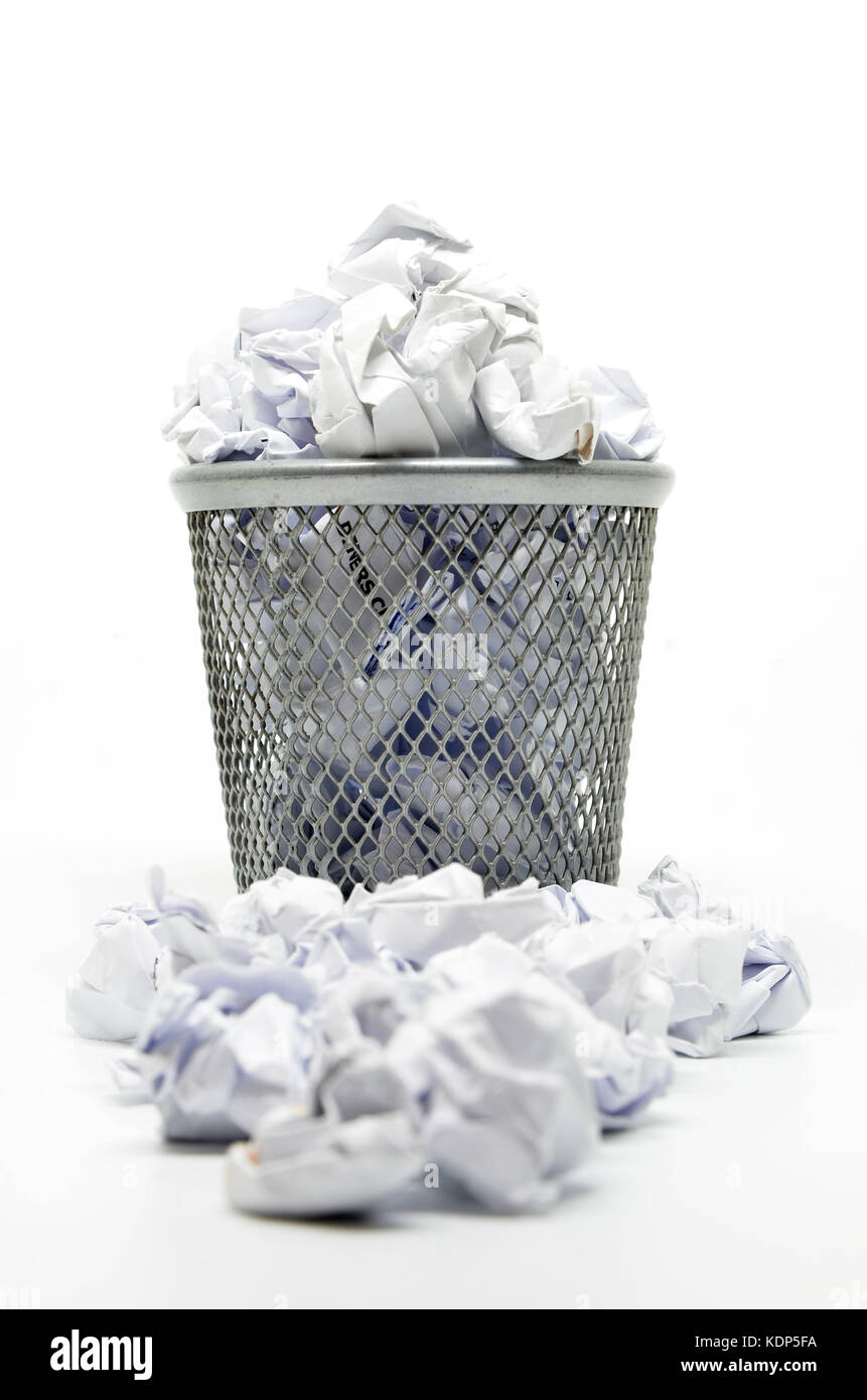 Garbage bin with paper waste isolated on white Stock Photo - Alamy