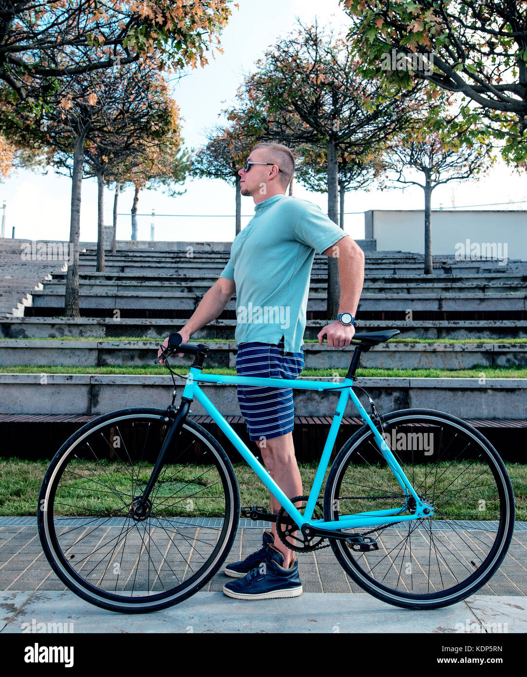 Young athletic guy bike hi-res stock photography and images - Alamy