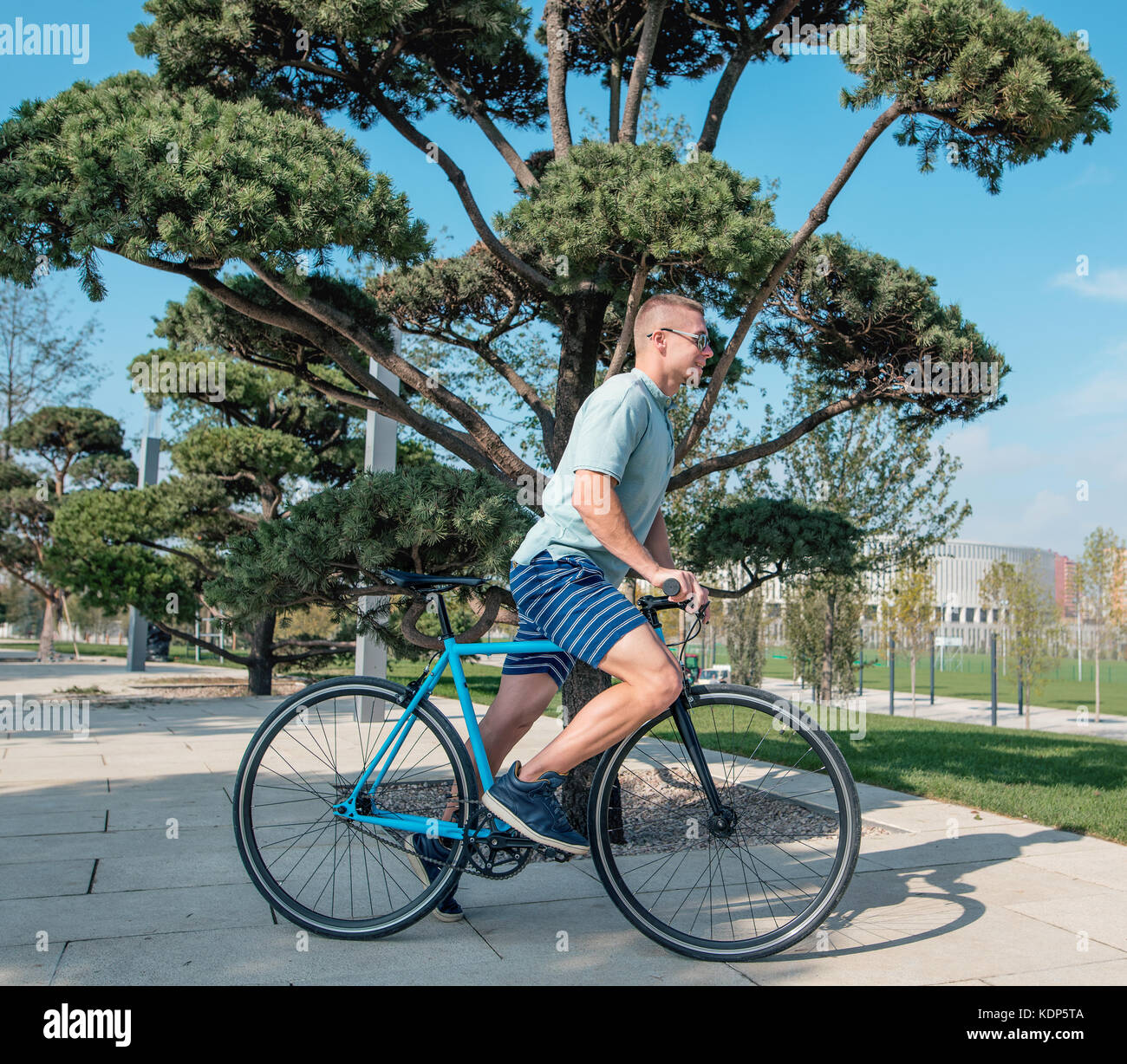 Athletic person bike standing hi-res stock photography and images - Alamy