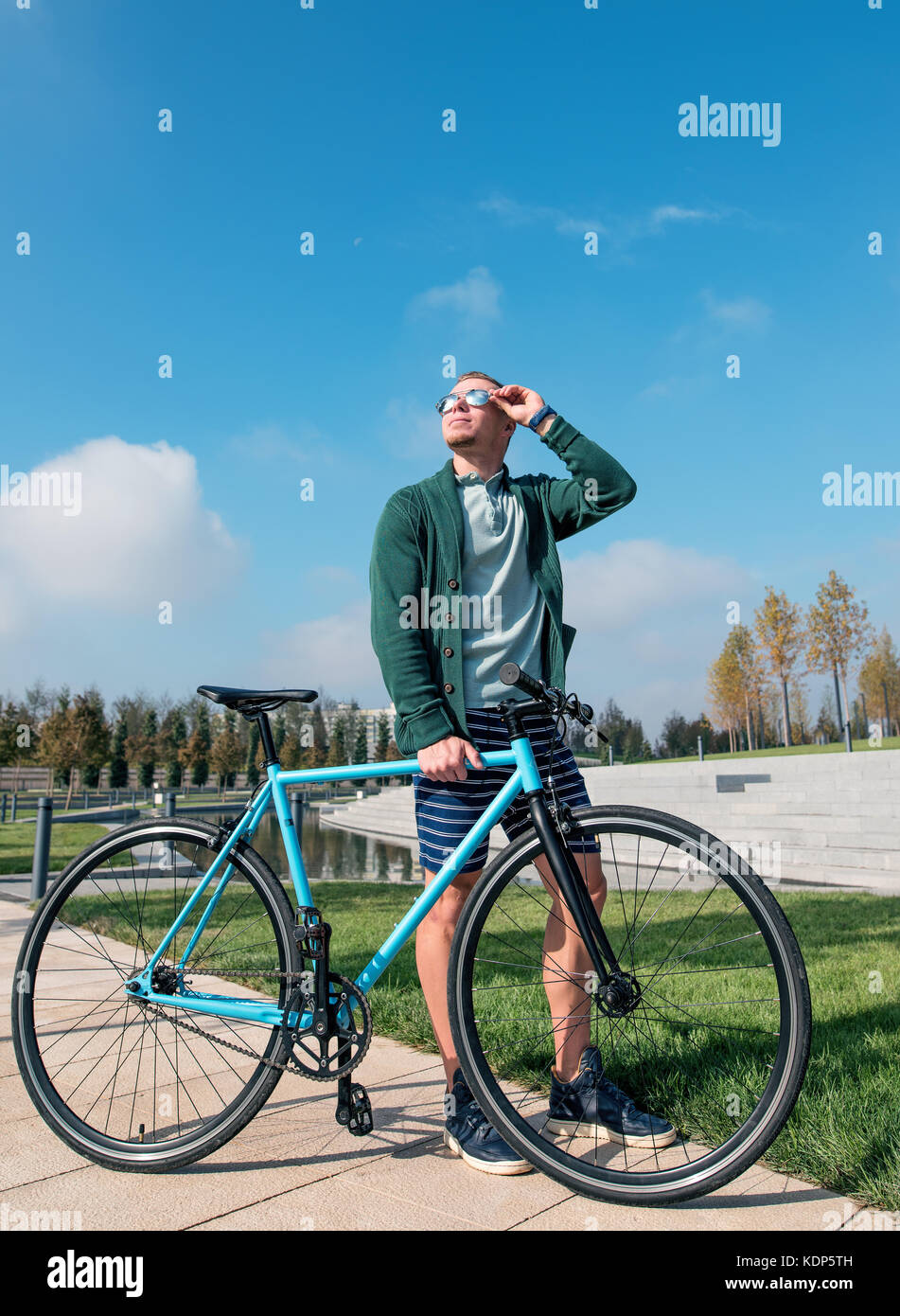man riding a Bicycle Stock Photo - Alamy