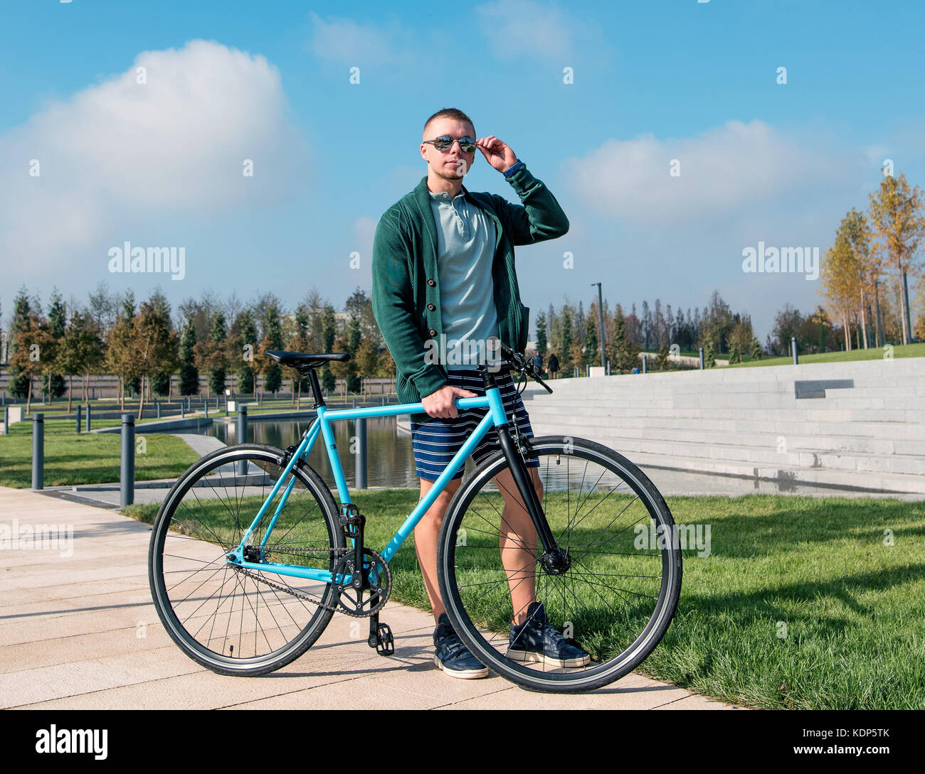 Healthy lifestyle man cycling bicycle path biker biking hi-res stock ...