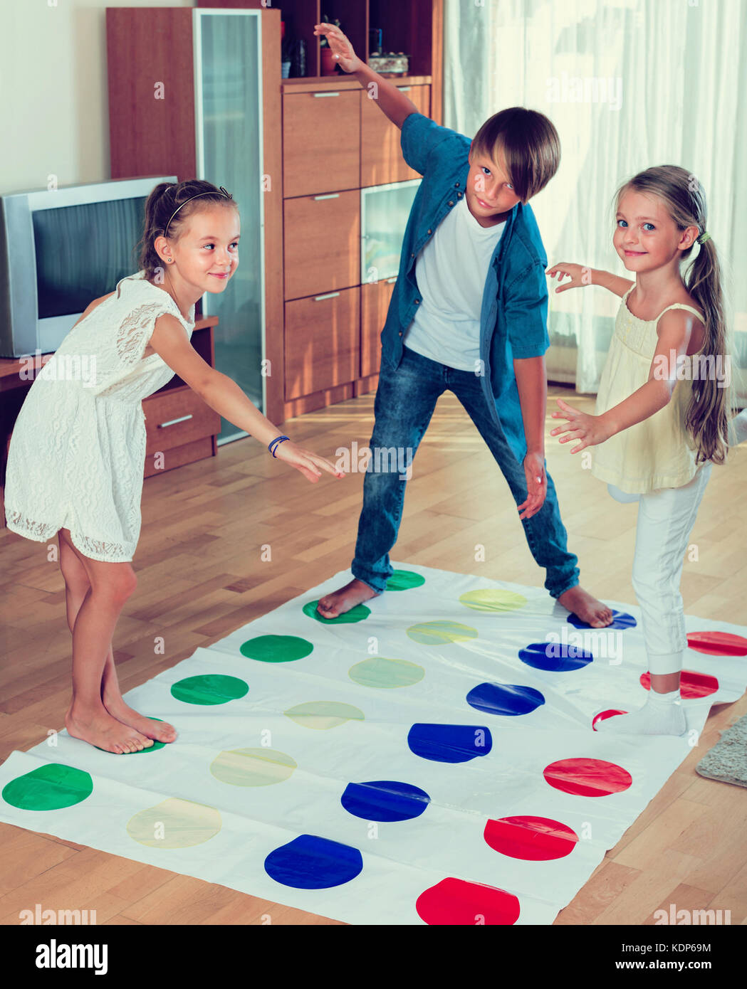 Children playing twister hi-res stock photography and images - Alamy