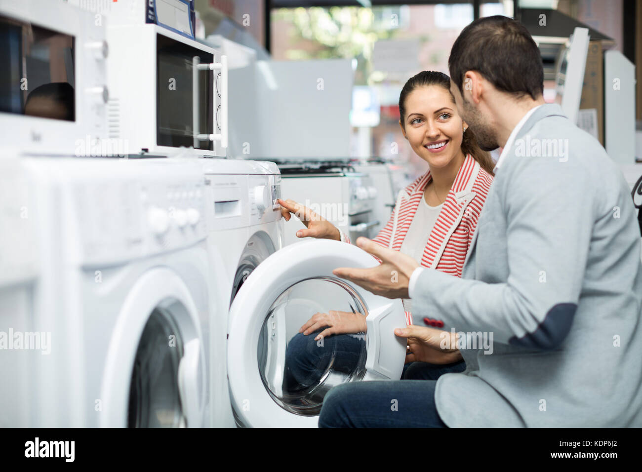 Customers washing clothes hi-res stock photography and images - Alamy