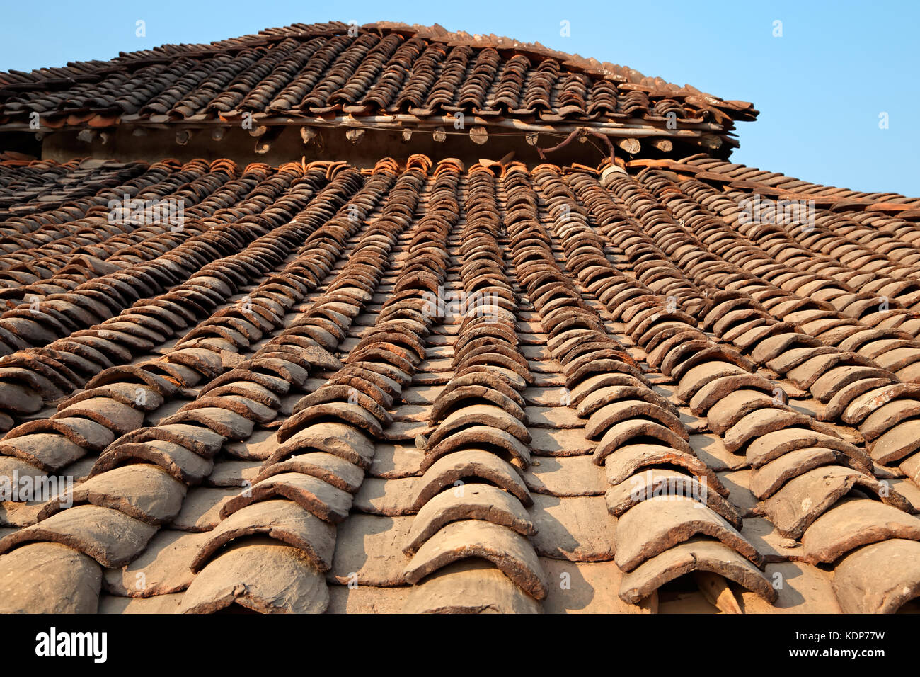 Roof of a typical Indian rural house build from rough tiles Stock Photo ...