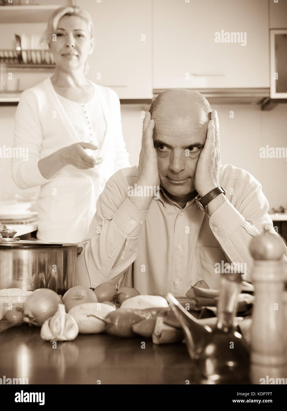 Woman in despair cooking hi-res stock photography and images - Alamy