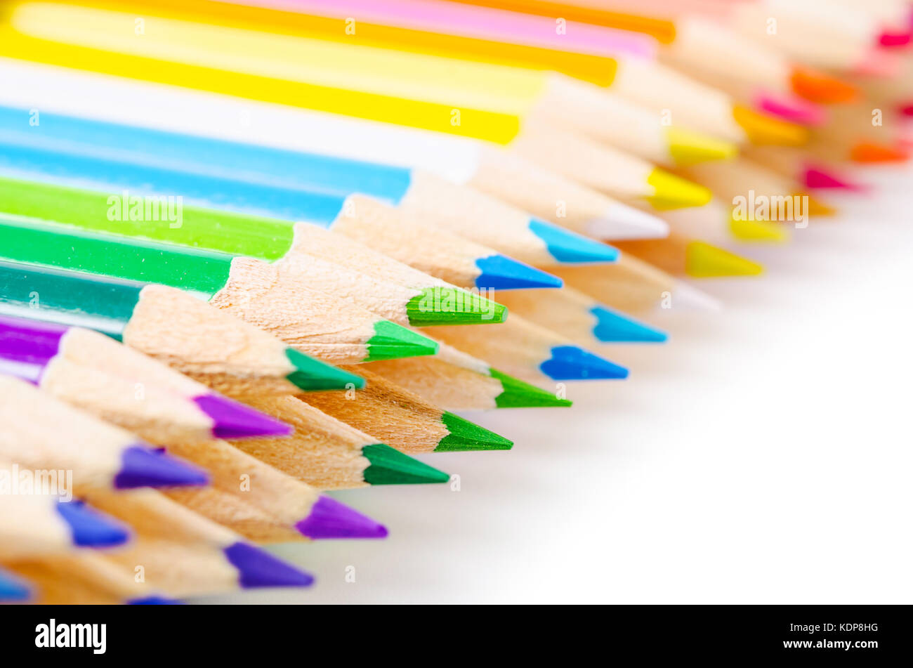 many different colored pencils islolated on a white background Stock ...