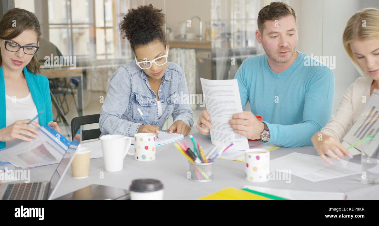 People working with documents Stock Photo - Alamy