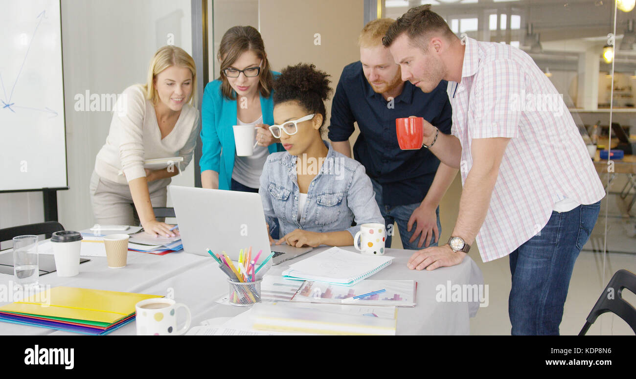 People watching laptop with interest Stock Photo - Alamy