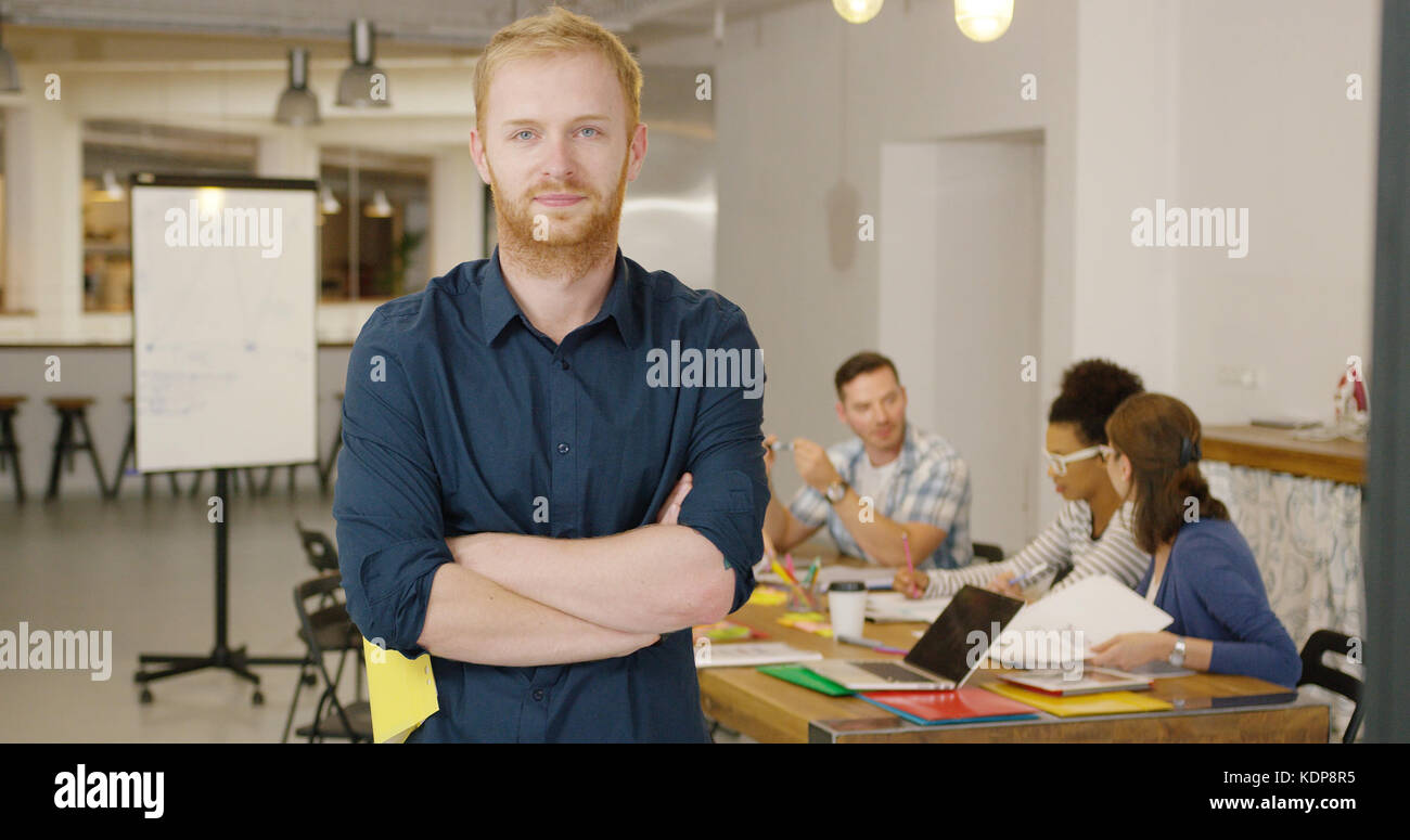 Confident male worker posing Stock Photo - Alamy