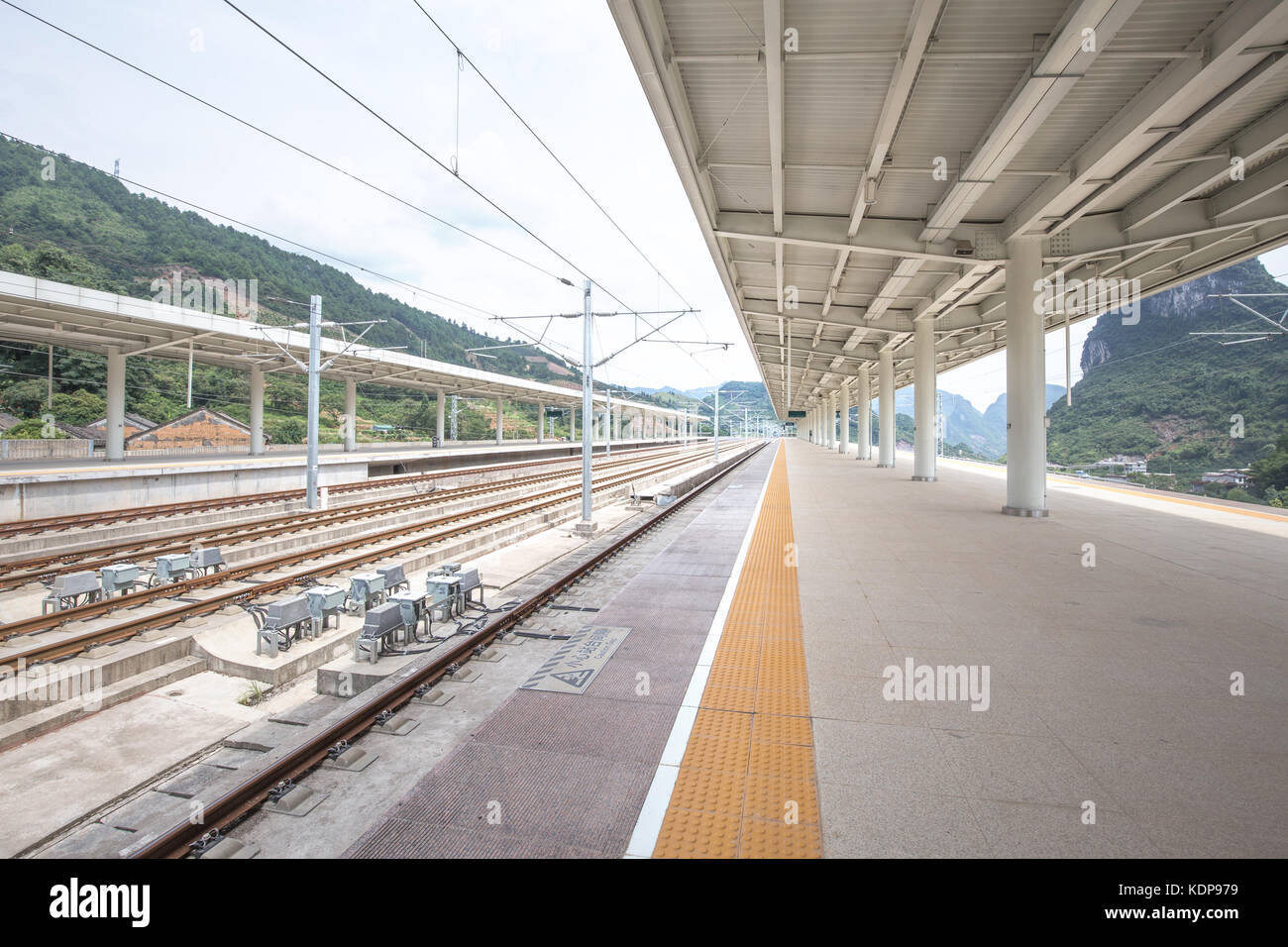 Railway station platform Stock Photo - Alamy