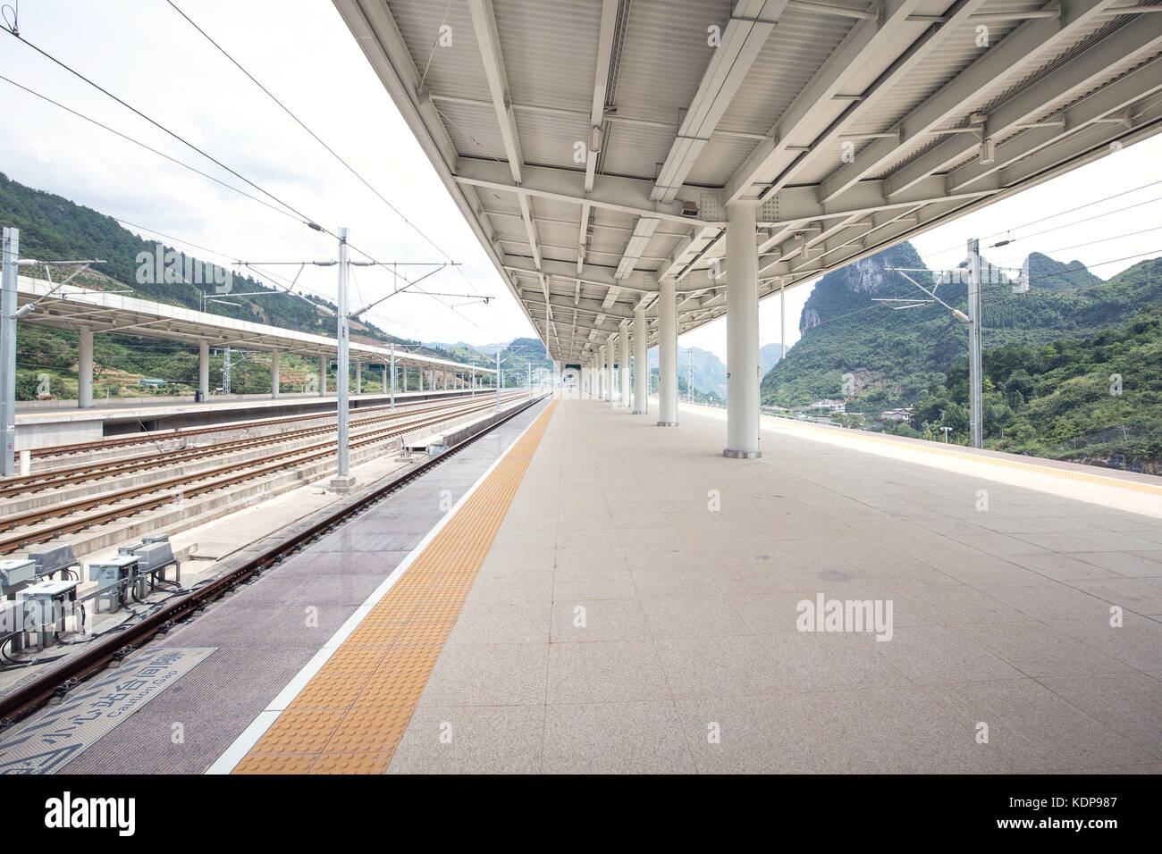 Railway station platform Stock Photo - Alamy