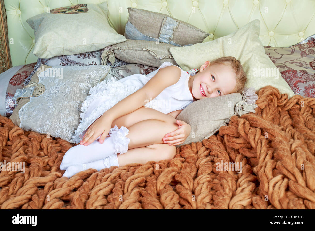 happy little girl in bed at home Stock Photo - Alamy