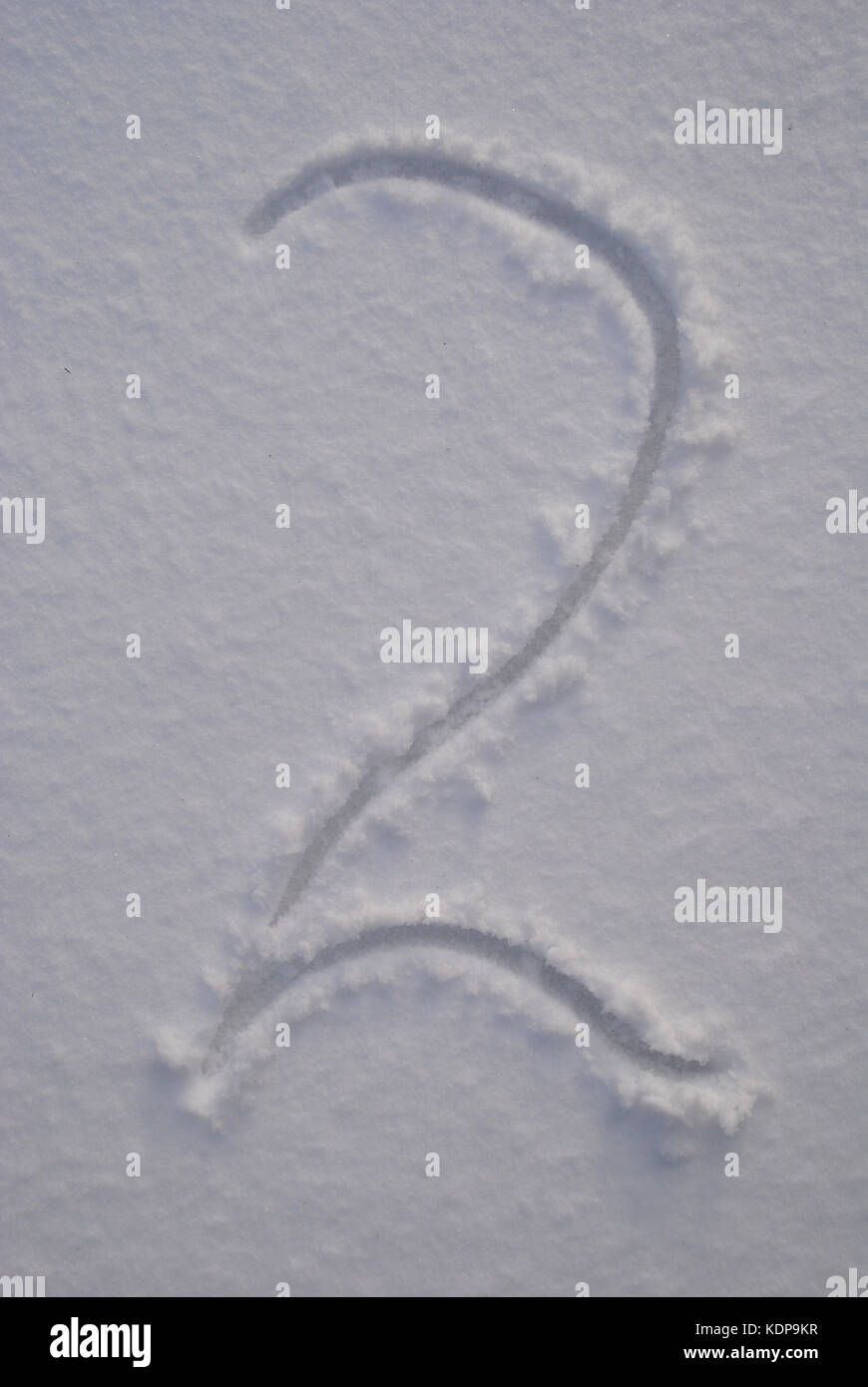 Winter numbers handwritten on snow background Stock Photo - Alamy
