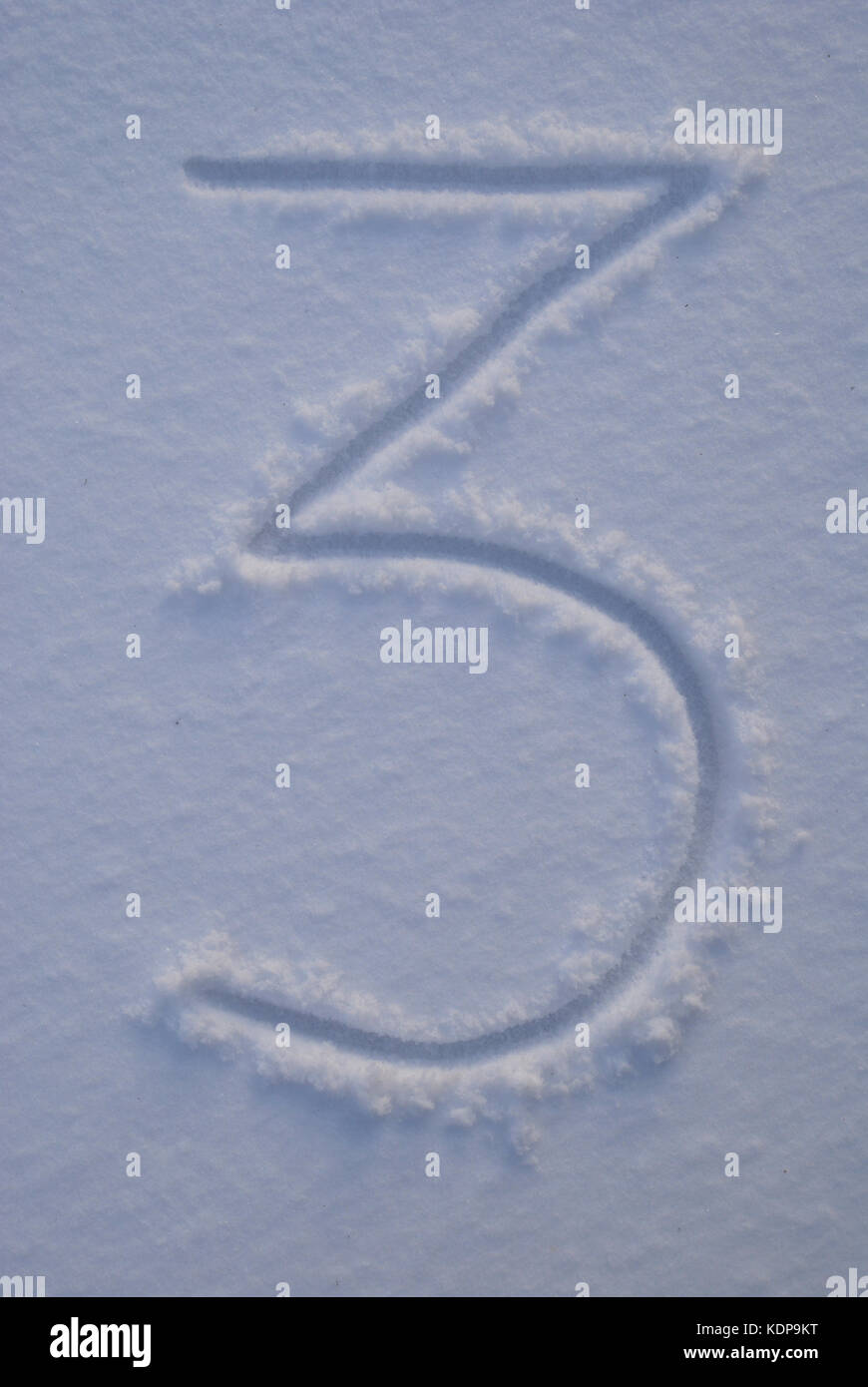 Winter numbers handwritten on snow background Stock Photo - Alamy