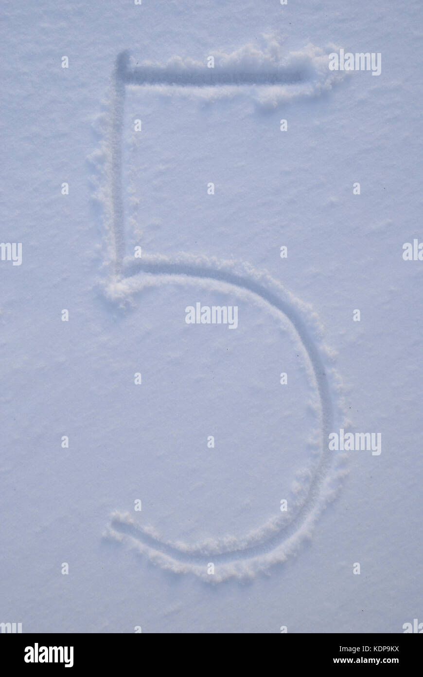 Winter numbers handwritten on snow background Stock Photo - Alamy