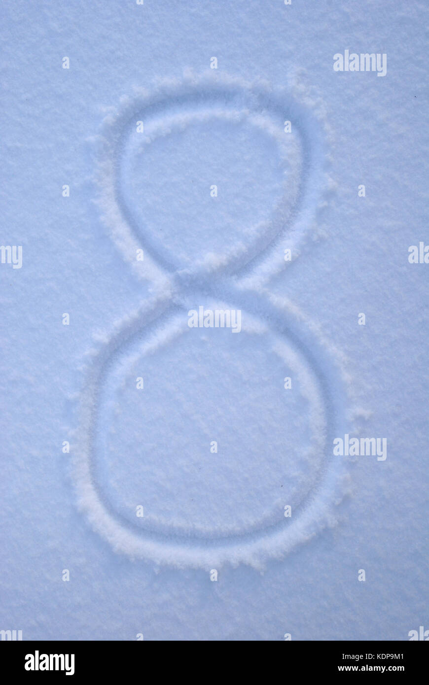 Winter numbers handwritten on snow background Stock Photo - Alamy