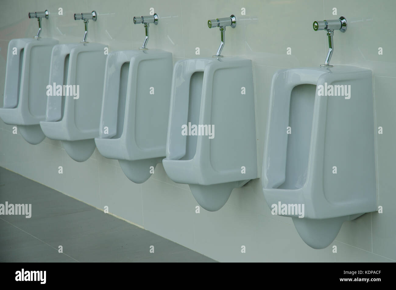 row of outdoor urinals men public toilet Stock Photo - Alamy