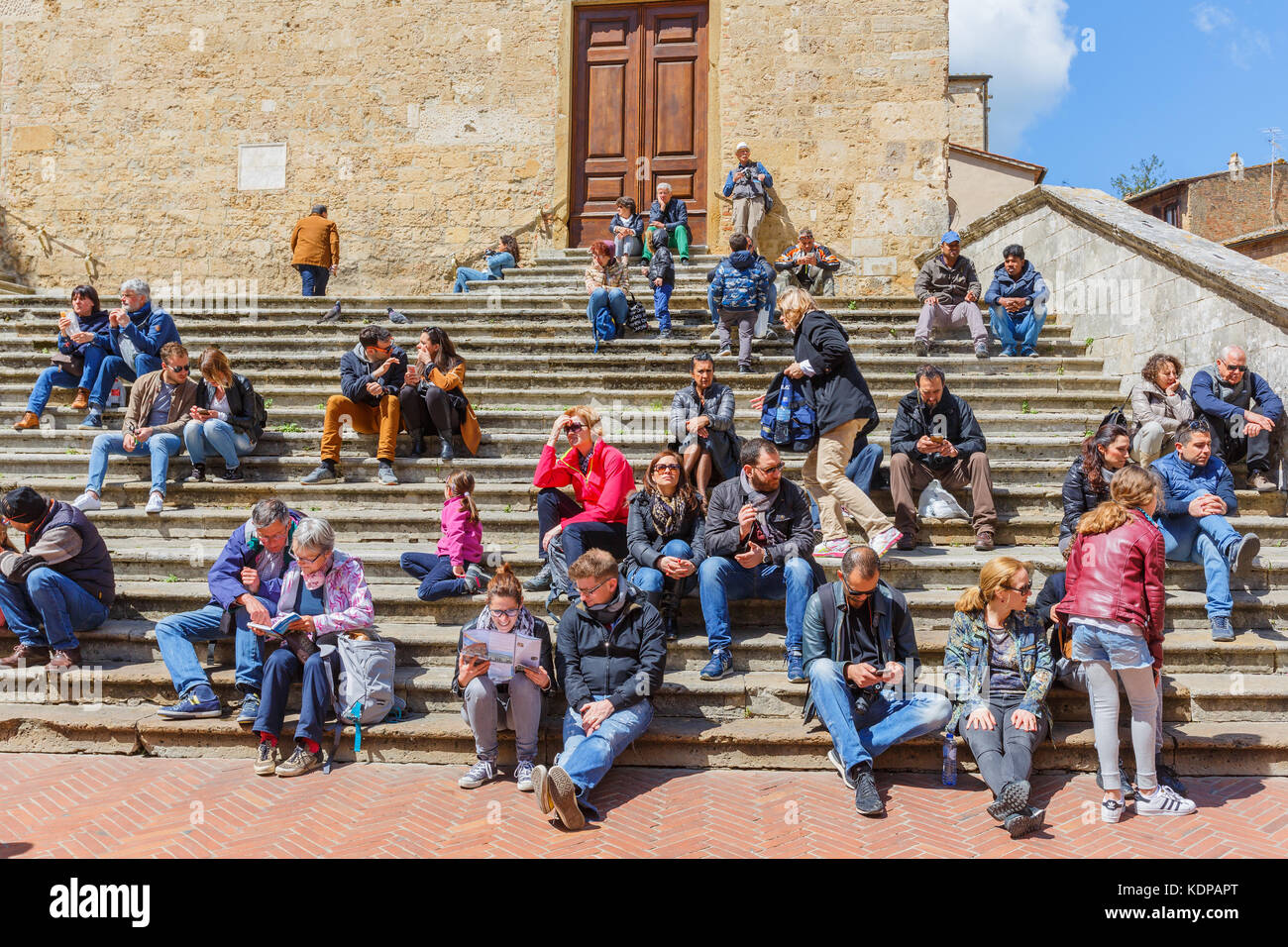 Man sitting on steps church hi-res stock photography and images - Alamy