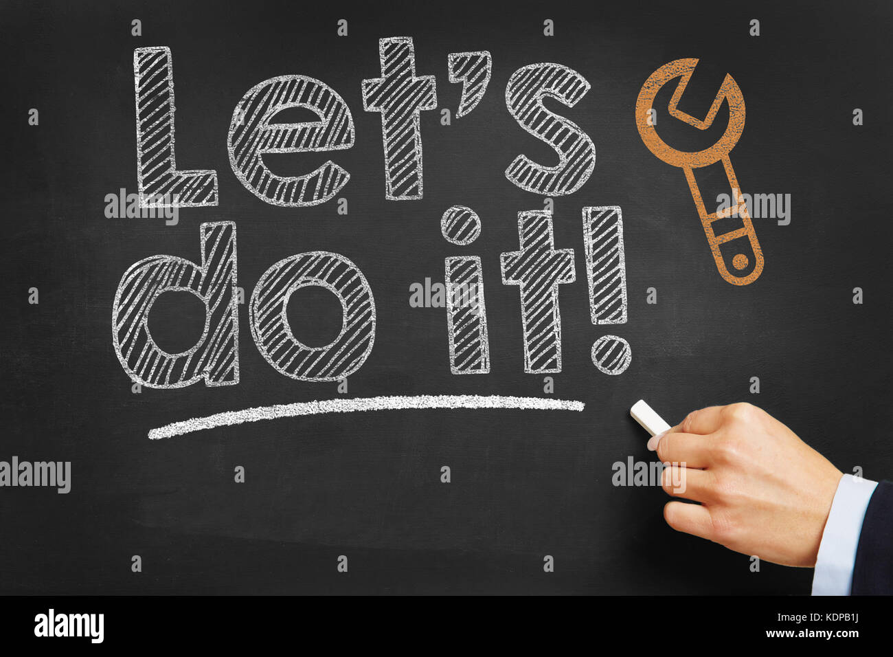 Let's do it! as motivation on chalkboard or blackboard Stock Photo - Alamy