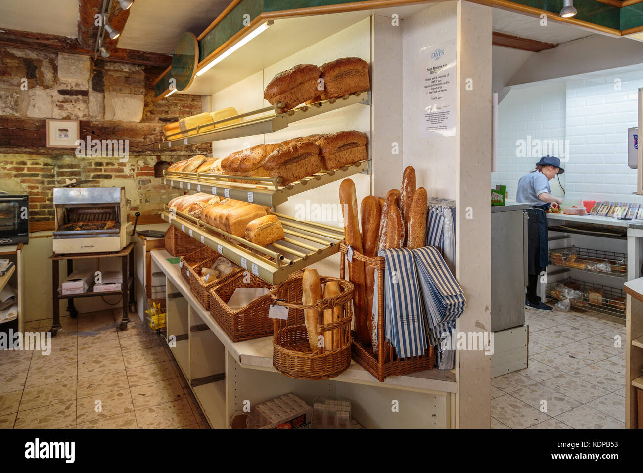 Freshly made bread and baguettes on display in Day's bakery shop ...