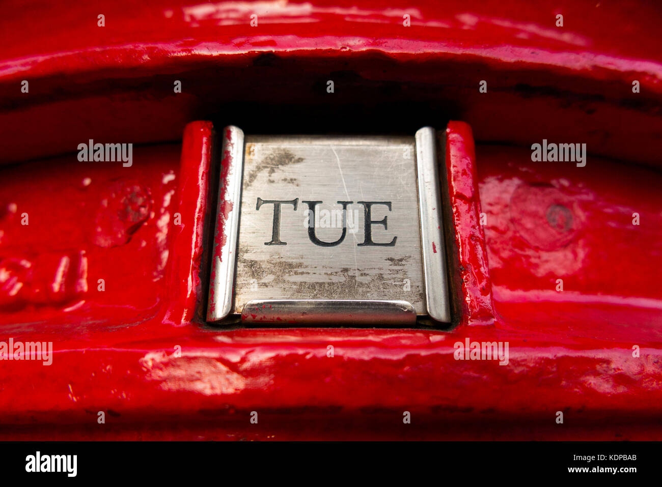 Day of the week letter collection plate / next collection sign on a red ...