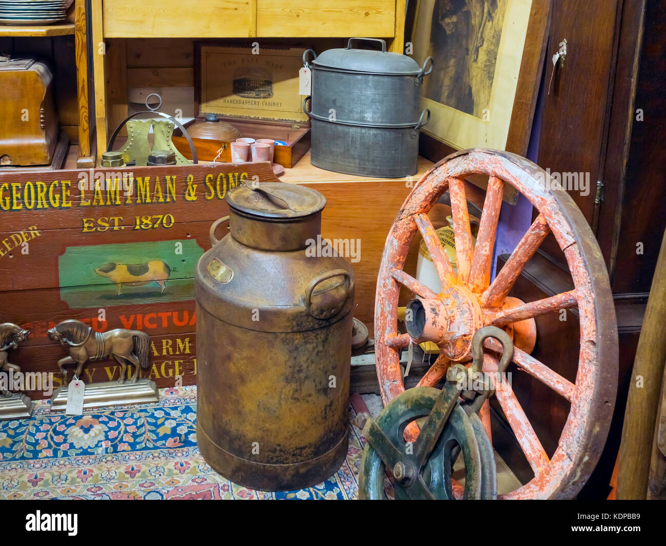 Interior of a rural antique shop with a collection of historic country ...