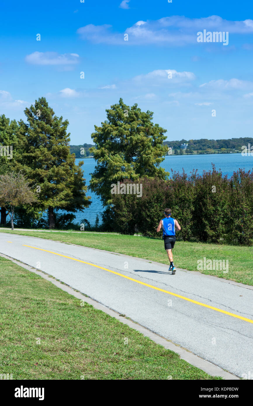 Lone male runner on a summer afternoon Stock Photo - Alamy