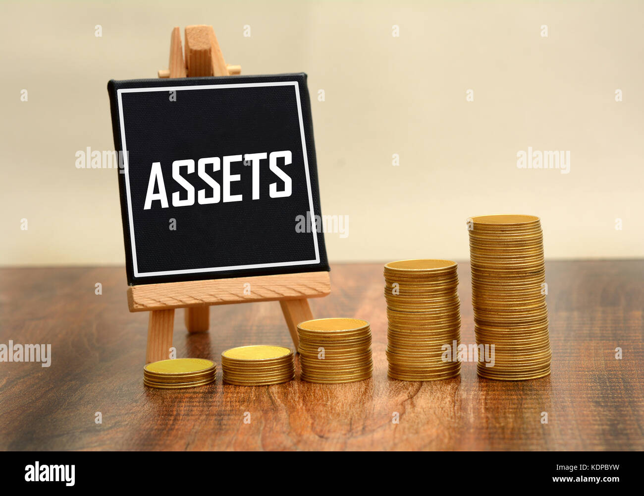 Asset Sign with Gold Currency Coins Stack Stock Photo - Alamy