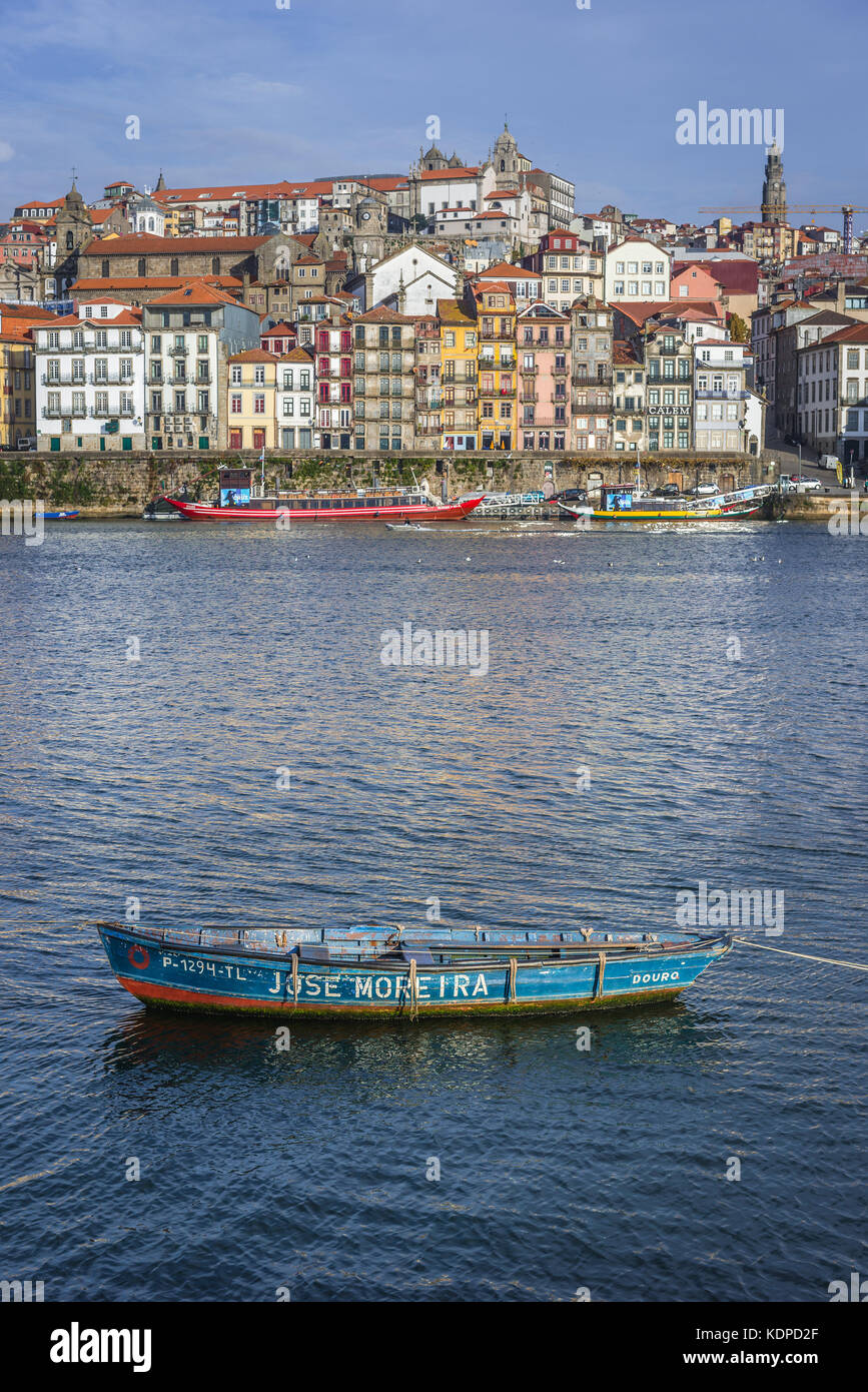 Old fishing dinghy on a Douro River seen from bank of Douro River in ...