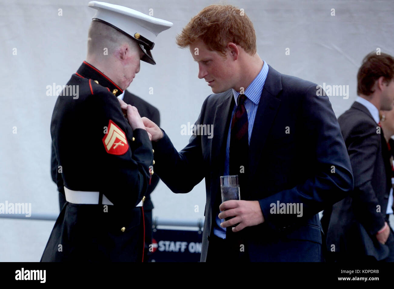 NEW YORK - JUNE 25: Prince Harry (R) speaks with U.S. Marine veteran ...