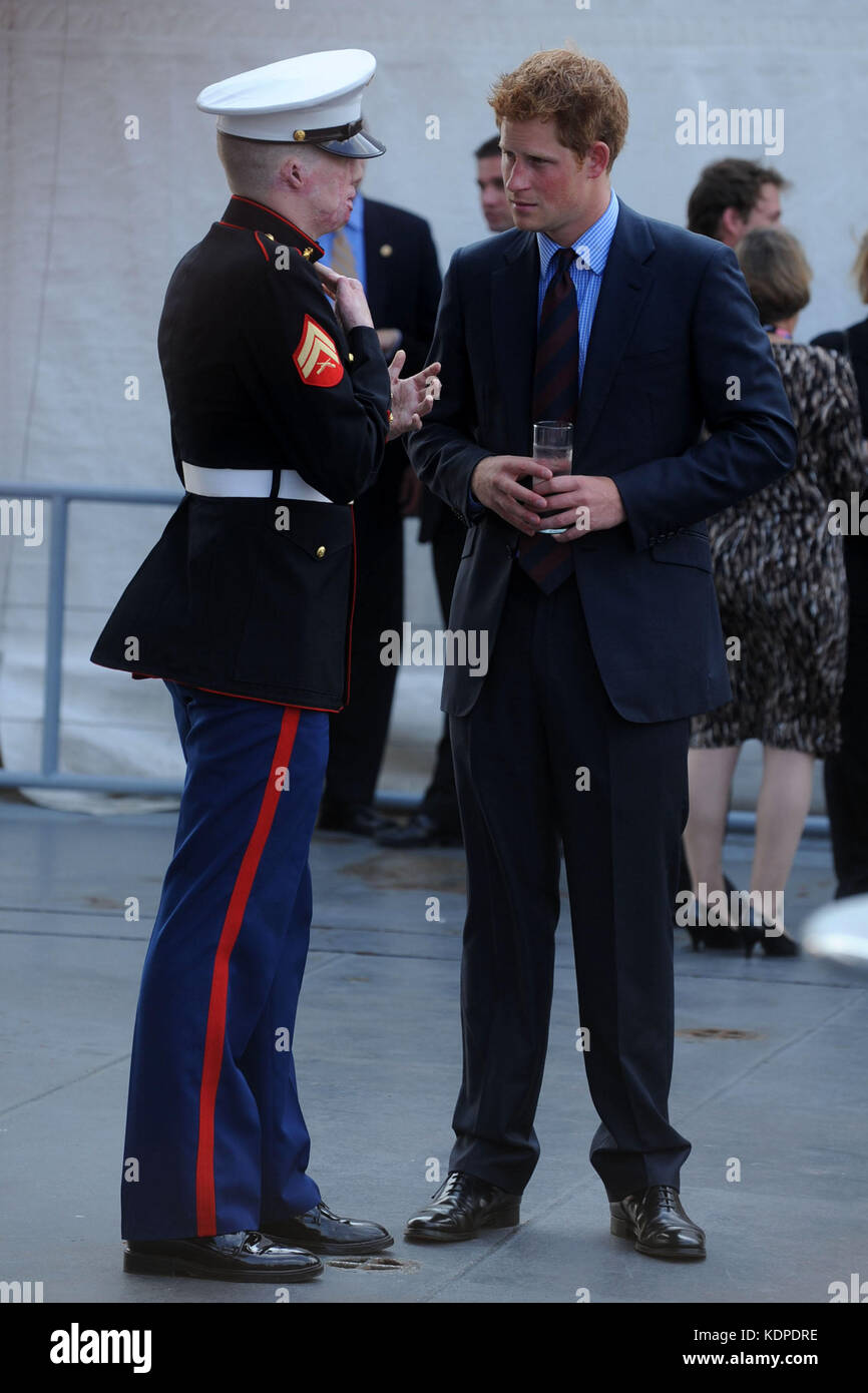 NEW YORK - JUNE 25: Prince Harry (R) speaks with U.S. Marine veteran ...
