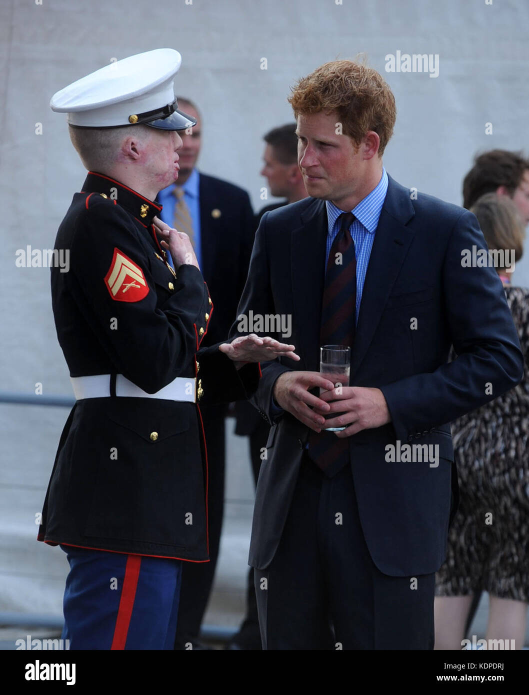 NEW YORK - JUNE 25: Prince Harry (R) speaks with U.S. Marine veteran ...