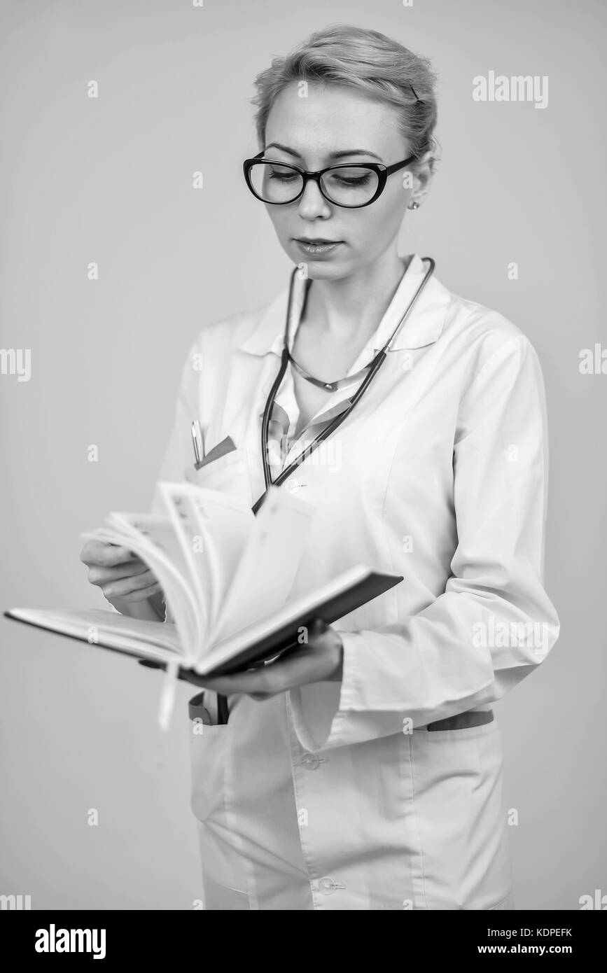 Doctor visit senior Black and White Stock Photos & Images - Alamy