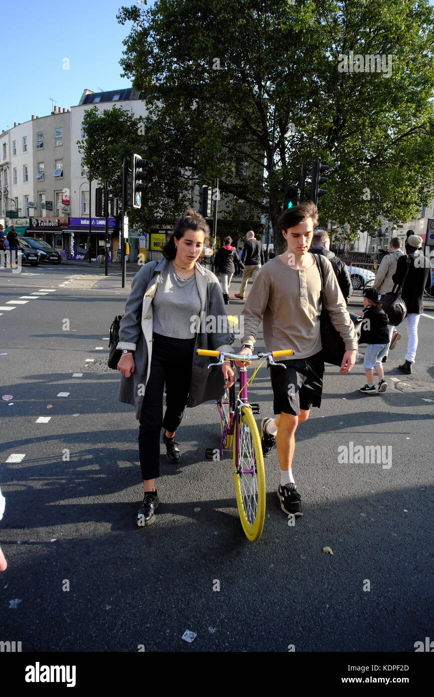 London bike crossing woman street hi-res stock photography and images ...