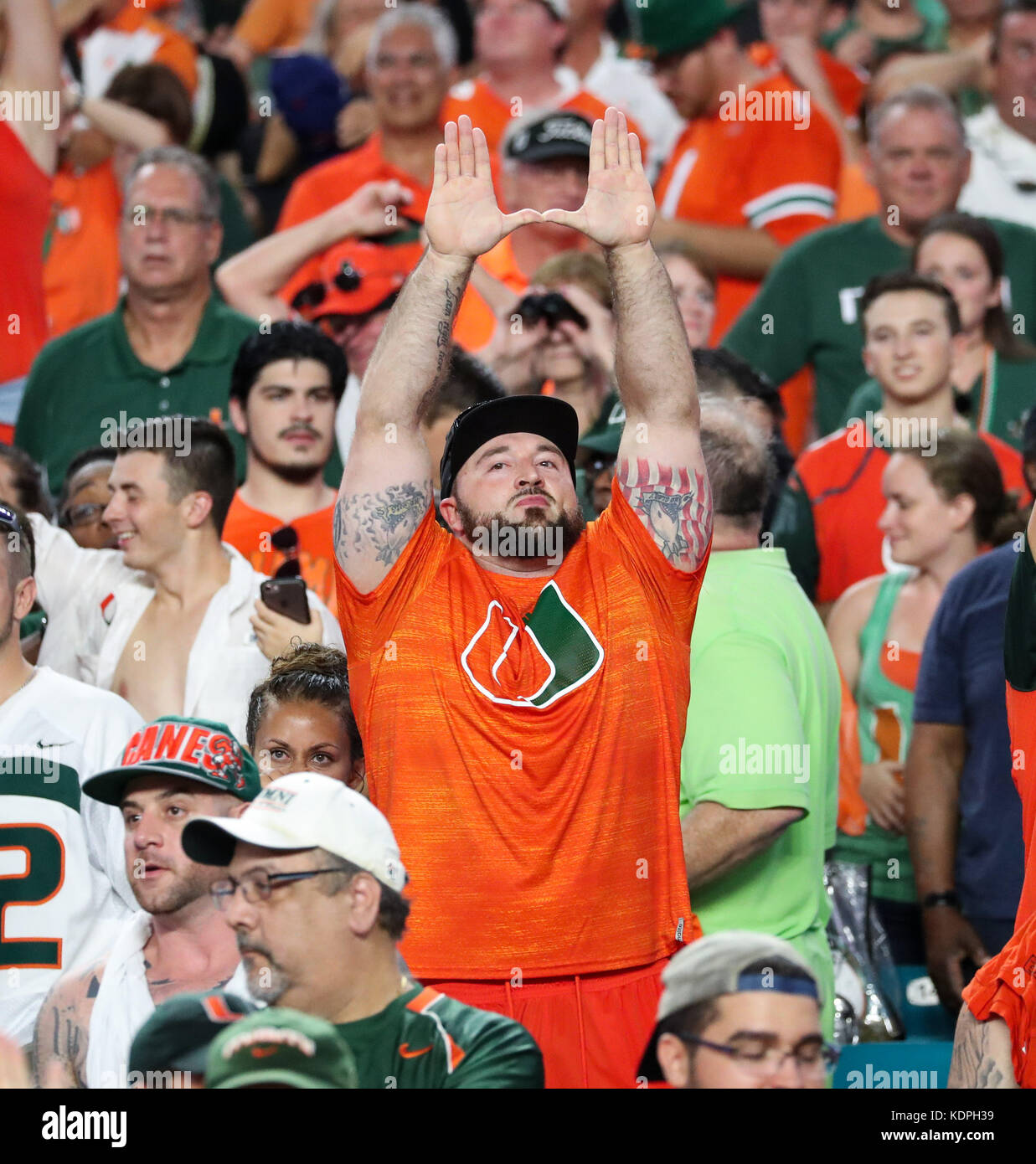 Miami Gardens, Florida, USA. 14th Oct, 2017. A Miami Hurricanes fan ...